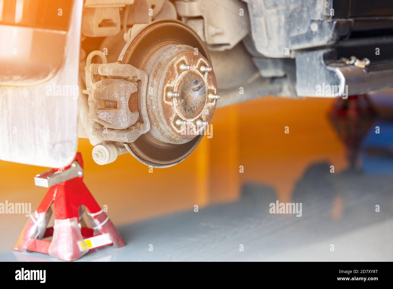 Close up Car brake part at garage, Old and dirty rear dump break of the ...