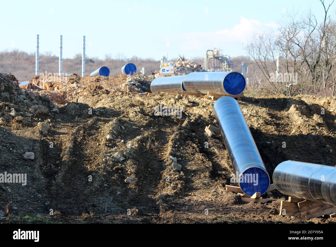 Construction site for new oil pipeline with multiple large diameter ...