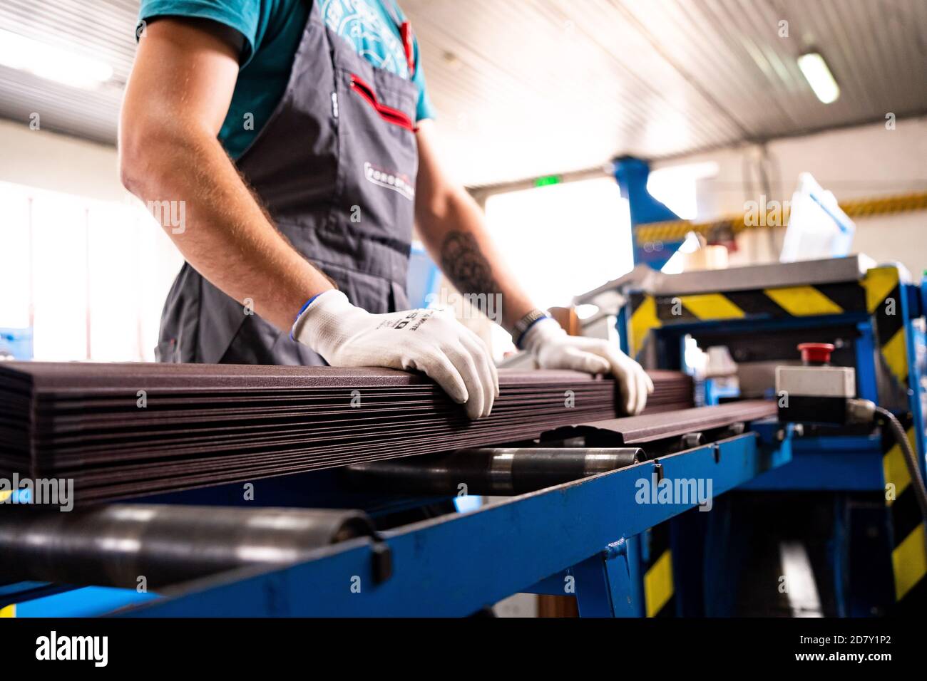 Worker at factory measures works metal production industrial Stock ...