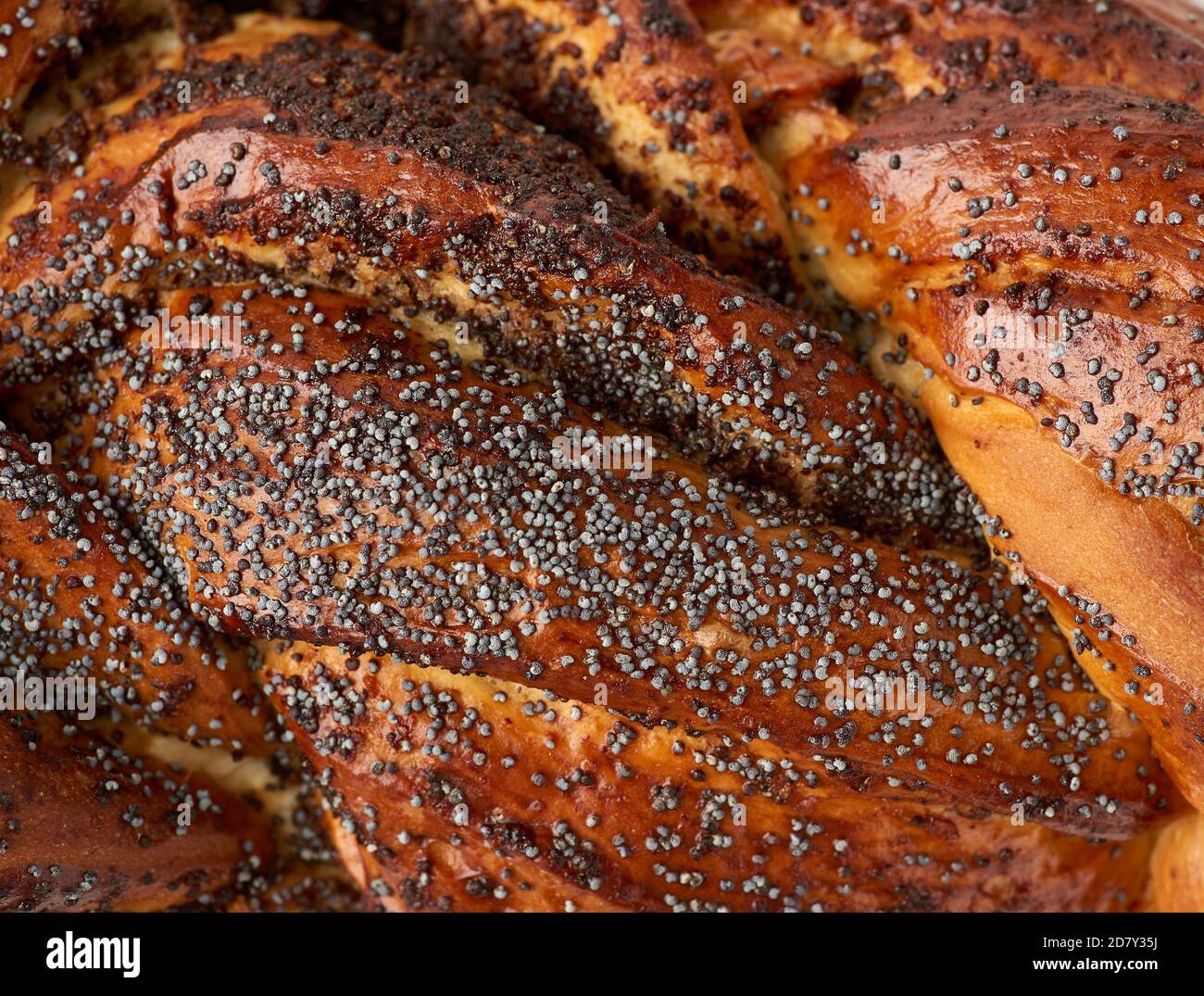 texture of baked wicker bun with poppy seeds, close up Stock Photo - Alamy