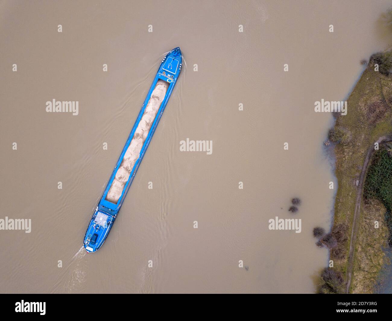 Top down view on inland cargo ship loaded with sand in dutch river ...