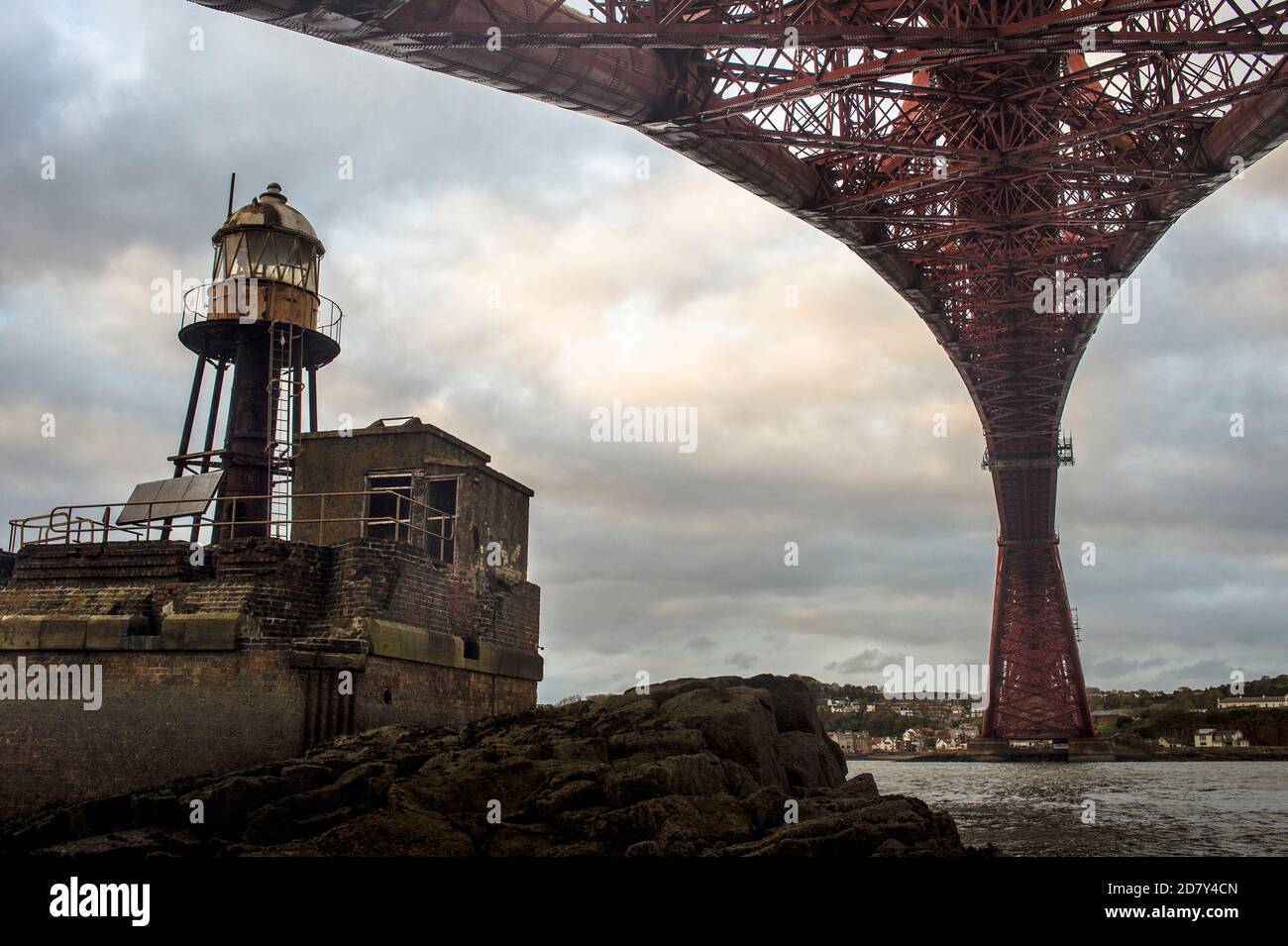 Views of Inchgarvie lighthouse and the Forth rail bridge in the Firth ...