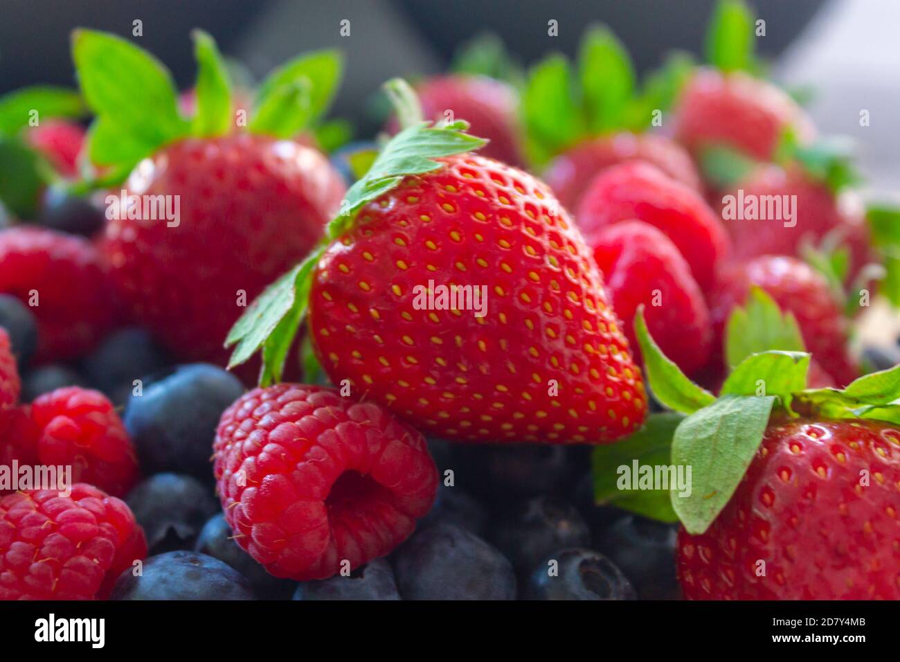 Fresh Strawberry, blueberry and raspberry.Colorful fresh forest fruits ...