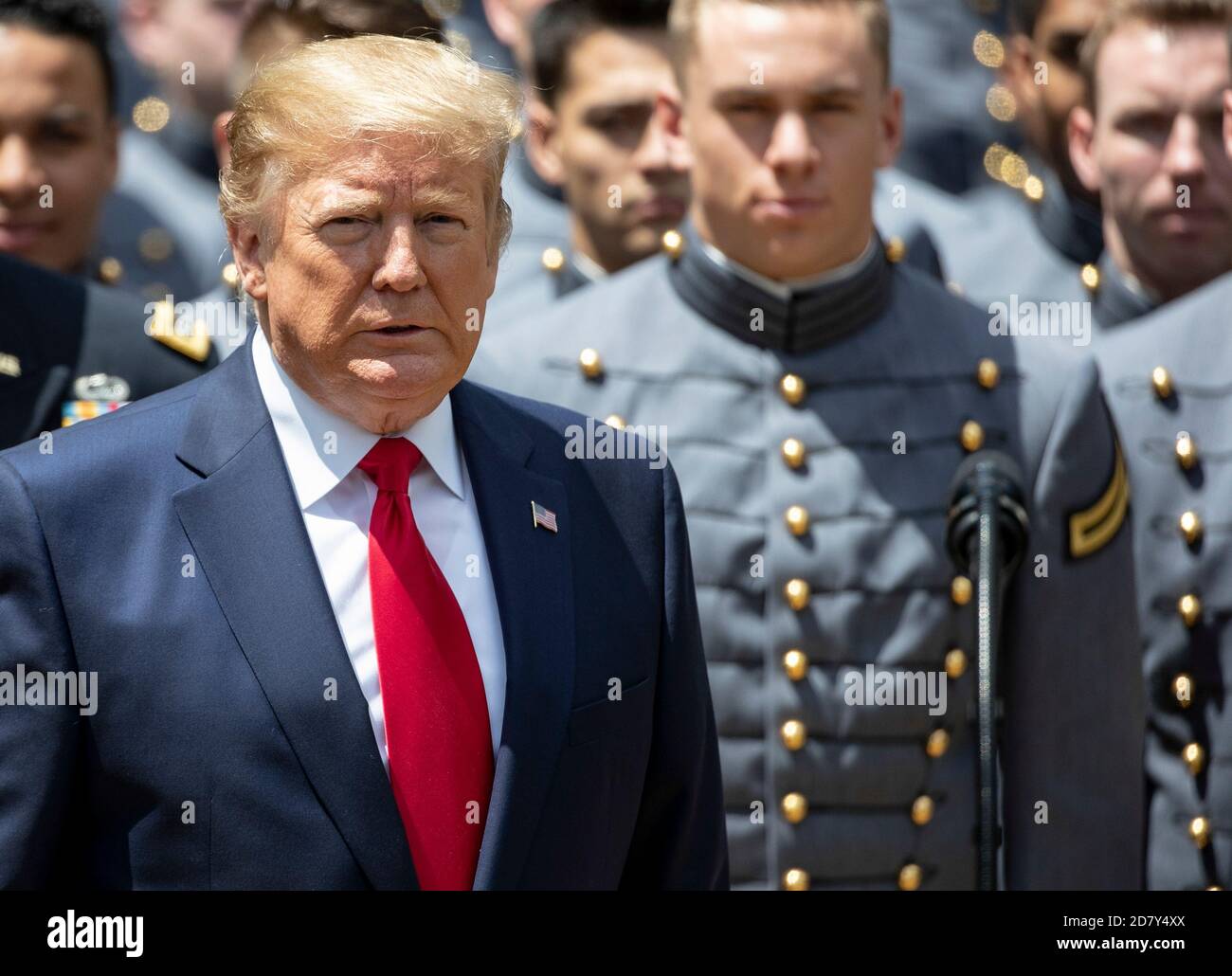 U.S. President Donald Trump enters the rose garden before delivering ...