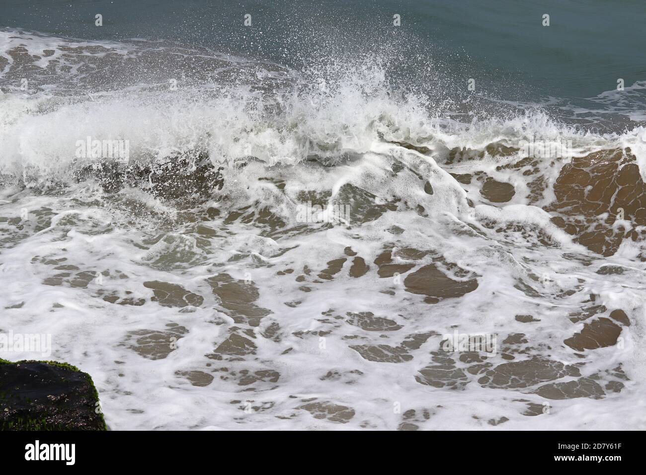 Background pattern of rising sea water on high tide during rainy days ...