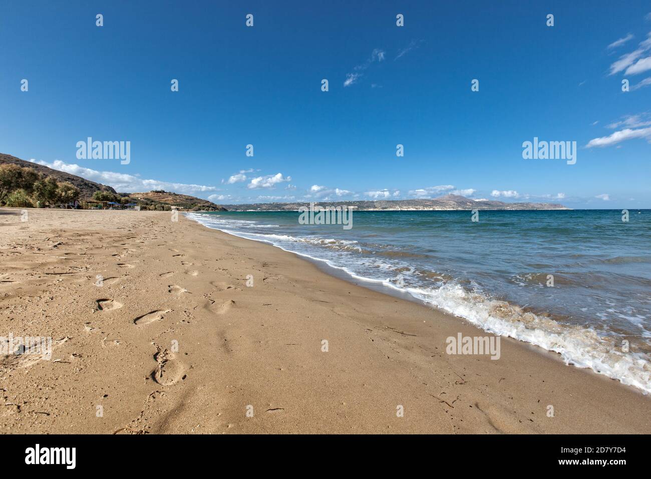 Footprints in the sand in the stunning beaches in Northern Crete Greece ...