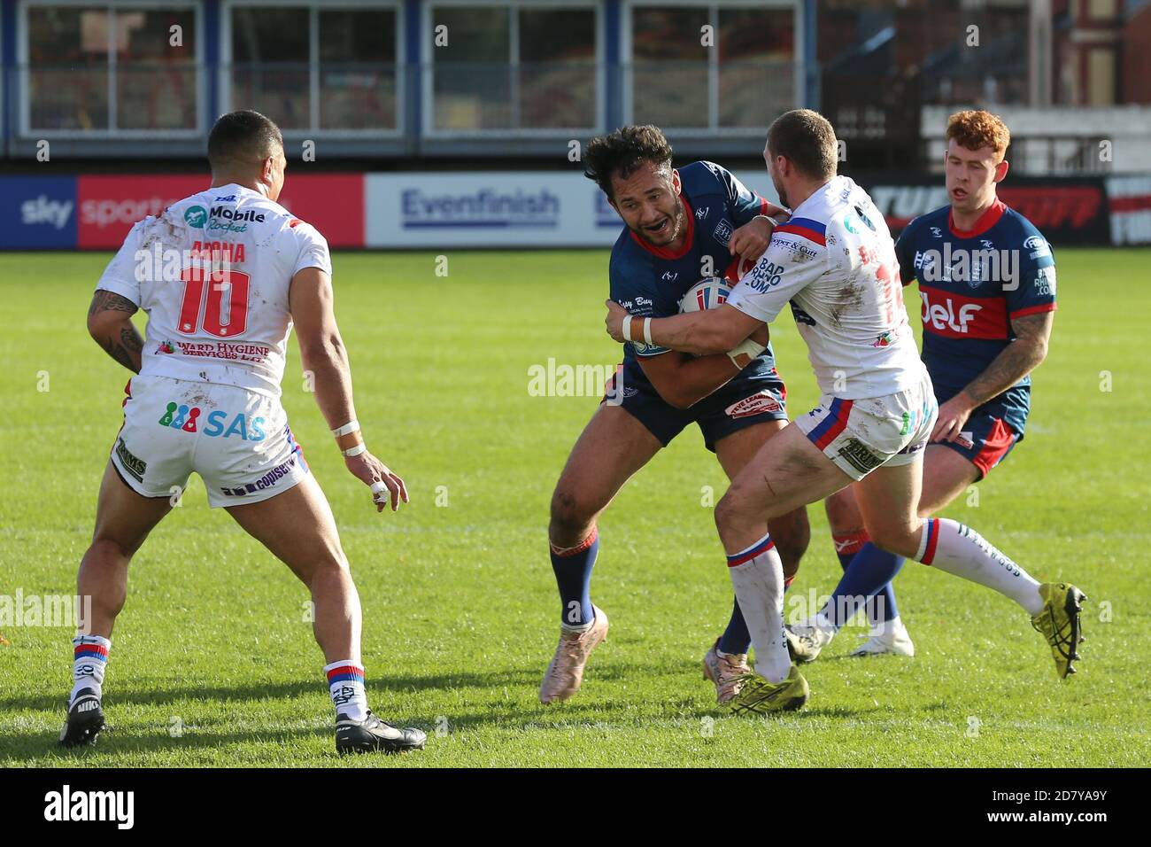 Nathaniel Peteru (32) of Hull KR tackled by James Batchelor (16) of ...