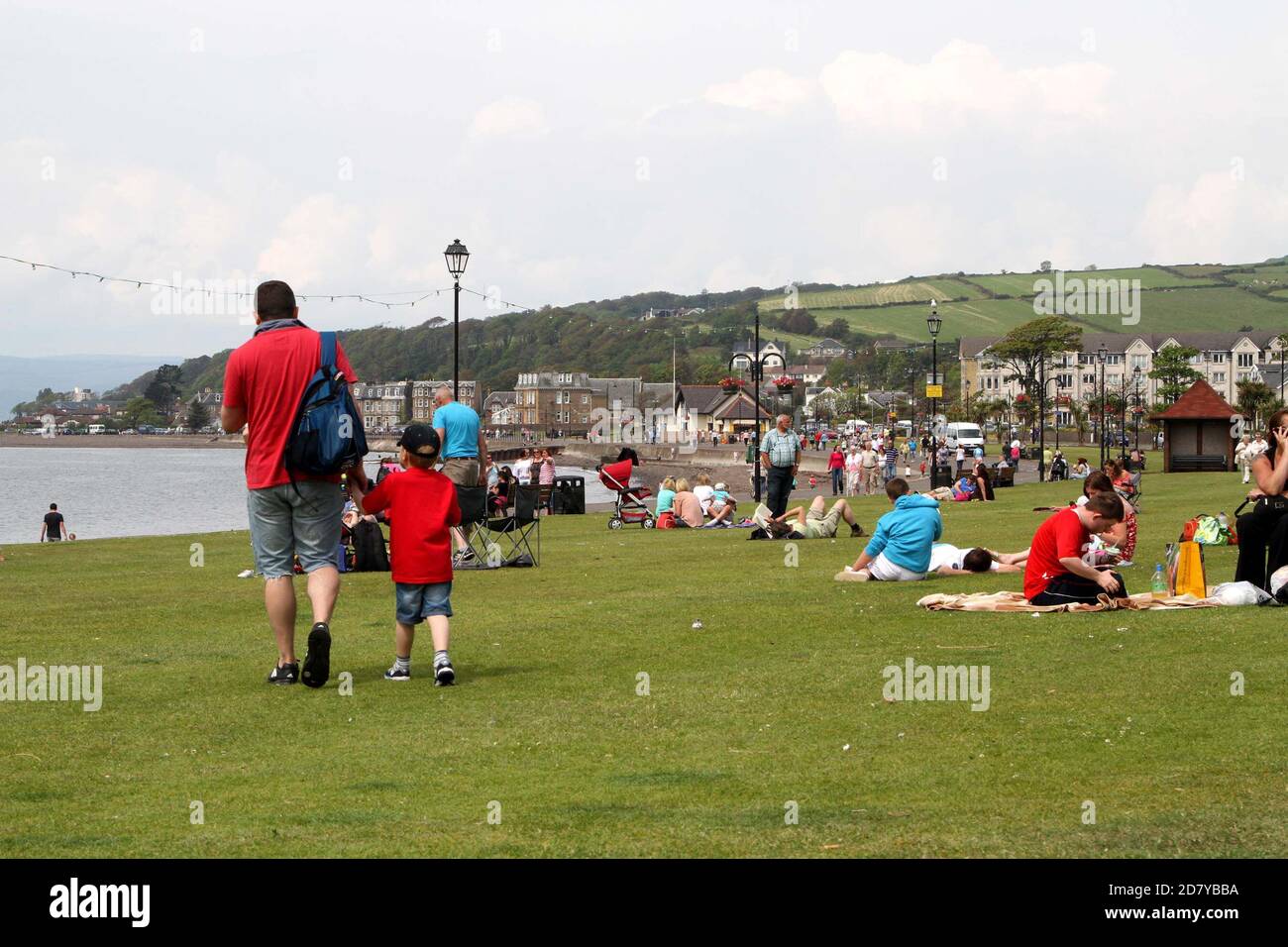 Largs, Ayrshire, Scotland, UK Seafront area people enjoying the weather ...