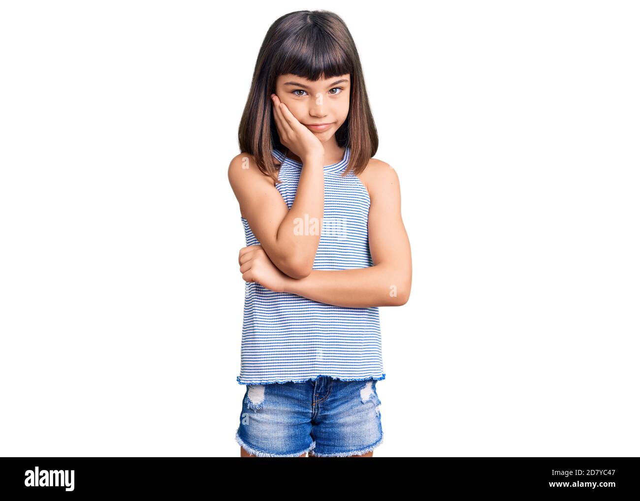Young little girl with bang wearing casual clothes thinking looking ...