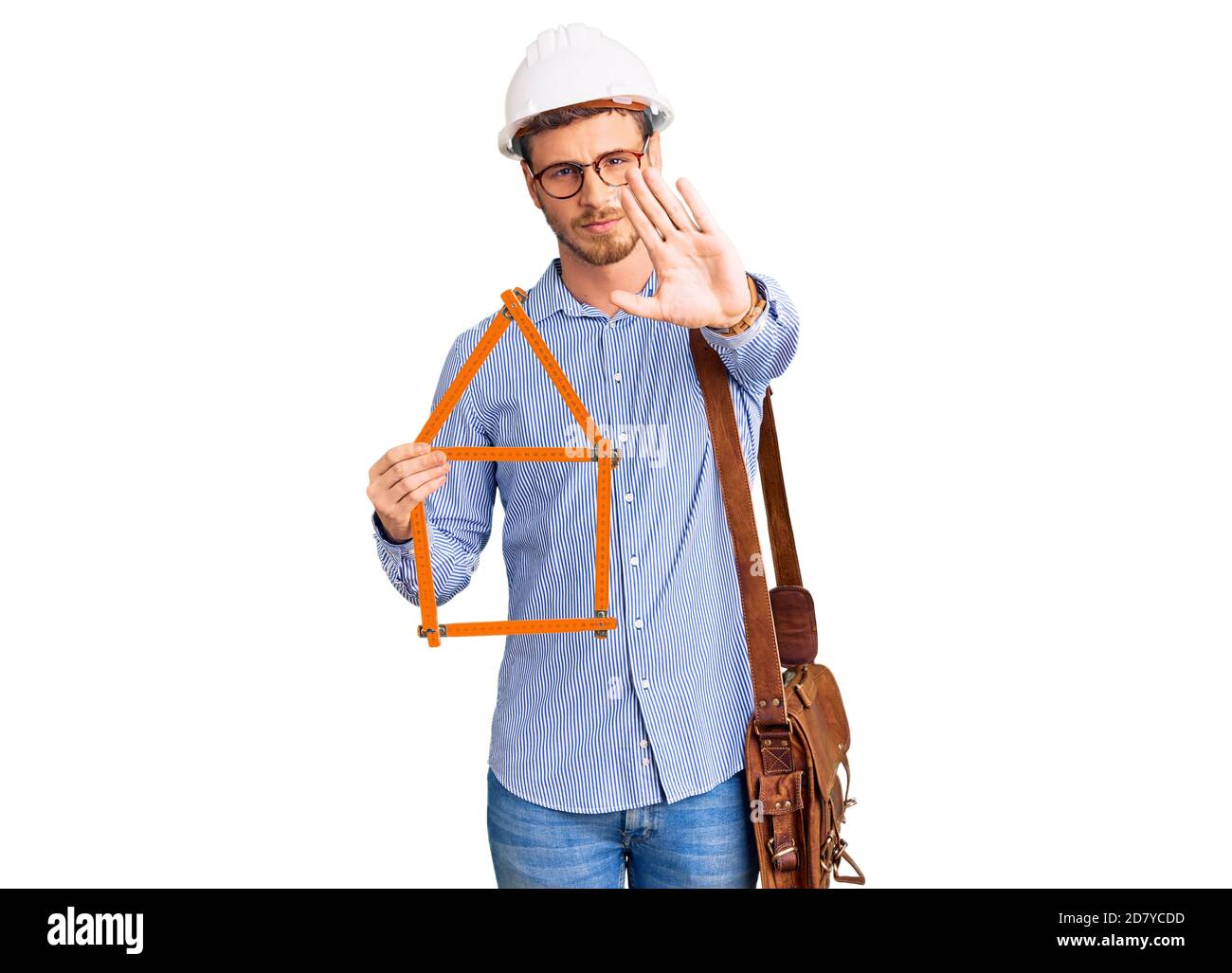 Handsome young man with bear wearing architect hardhat holding build ...