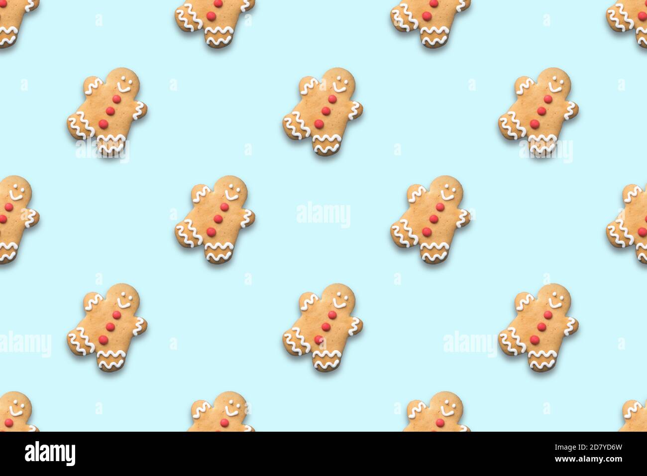 Gingerbread man on blue background hi-res stock photography and images ...
