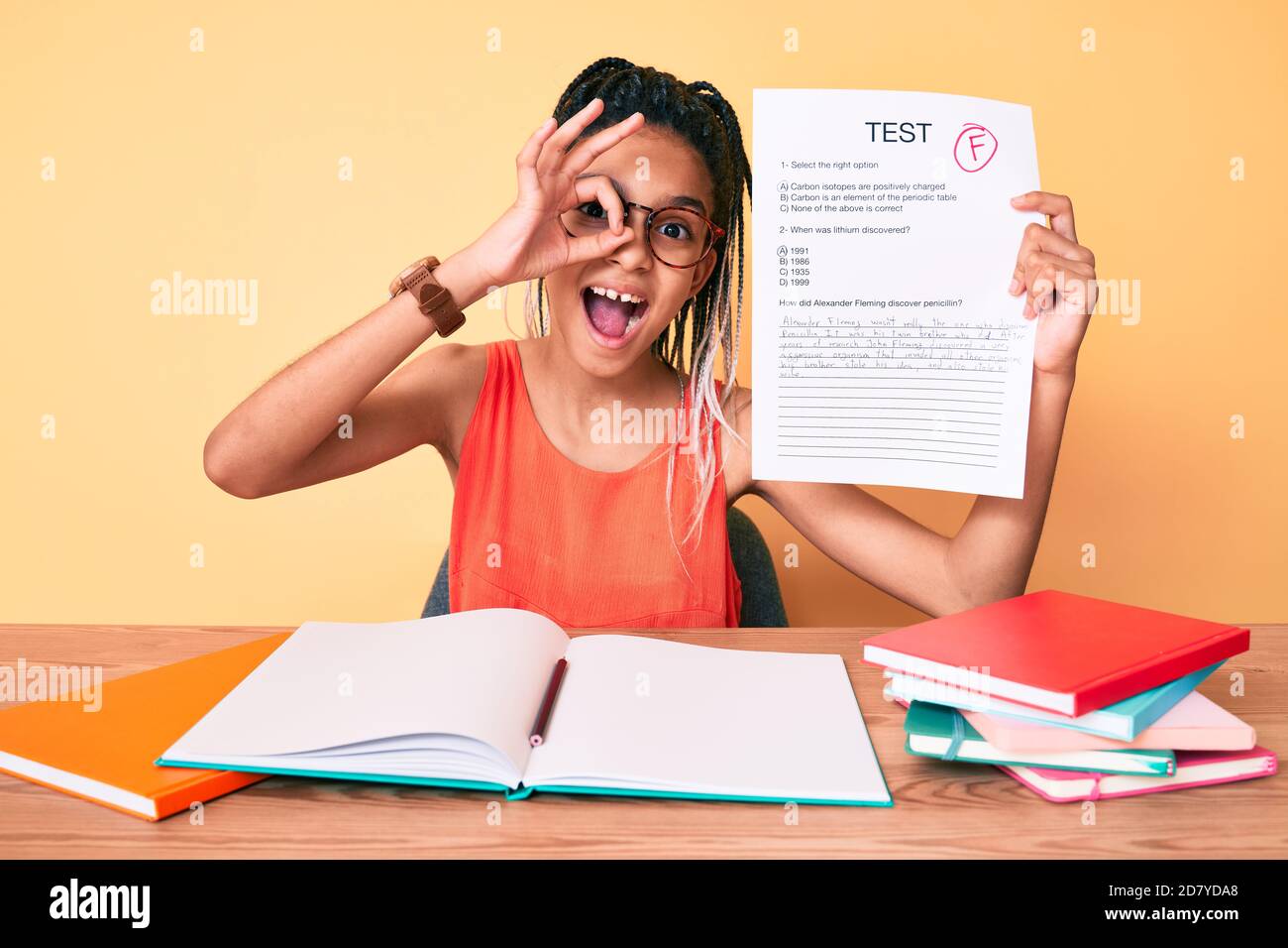 Young african american girl child with braids showing failed exam ...