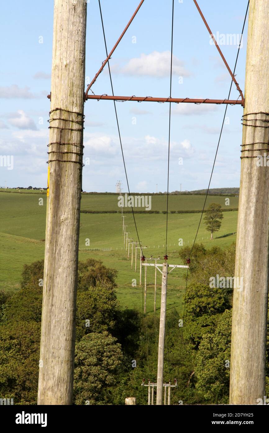 Overhead Electricity Powers lines in the Scottish Countryside, blue ...