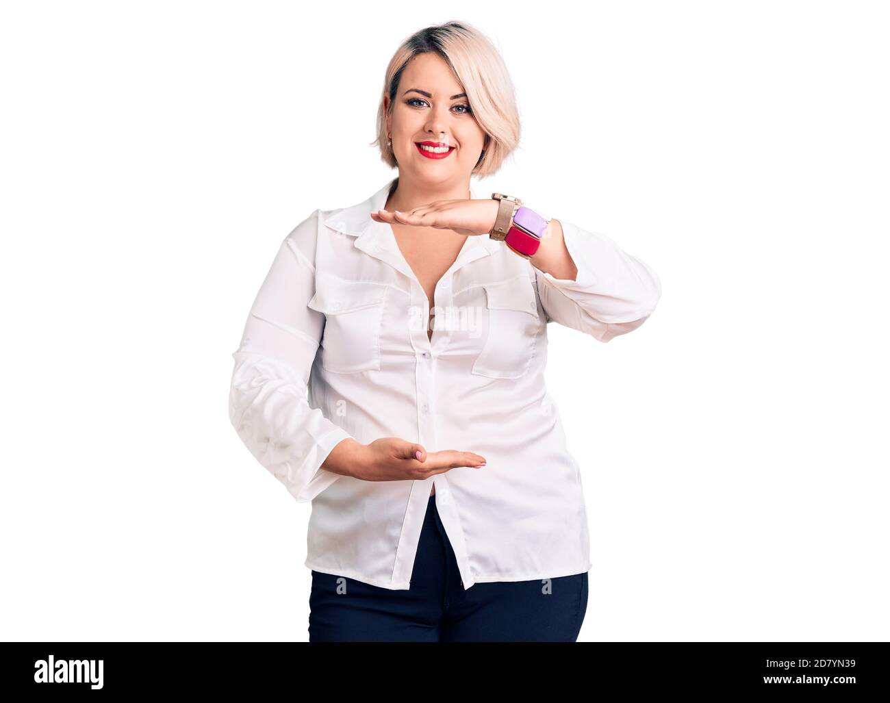 Young blonde plus size woman wearing casual shirt gesturing with hands ...