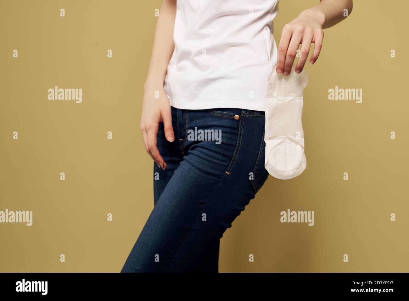 girl in jeans with a pad in hand hygiene clean appearance Stock Photo ...