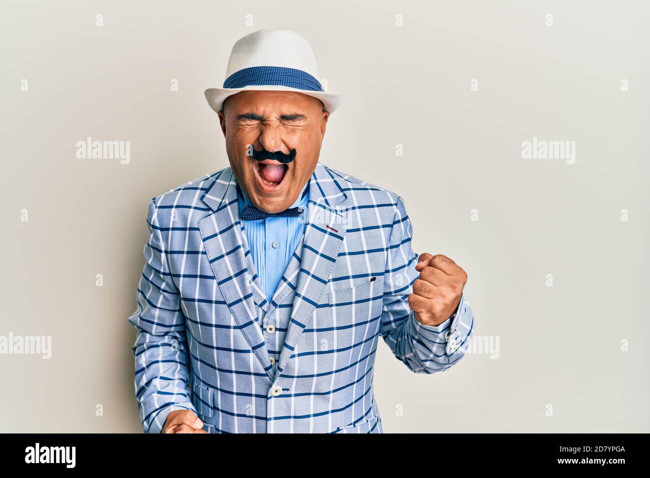Mature middle east man with mustache wearing vintage and elegant ...