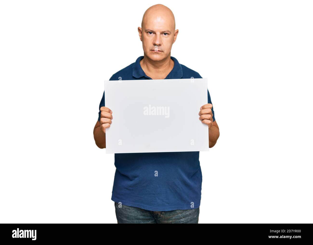 Middle age bald man holding blank empty banner thinking attitude and ...