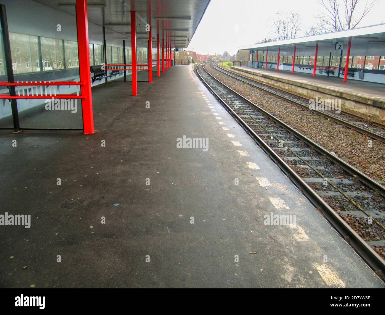 Empty train station in the suburbs Stock Photo - Alamy