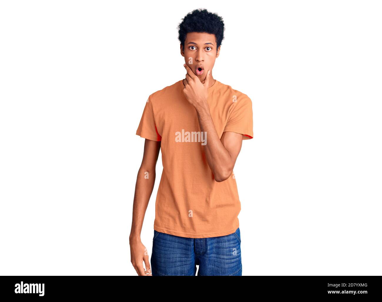 Young african american man wearing casual clothes looking fascinated ...