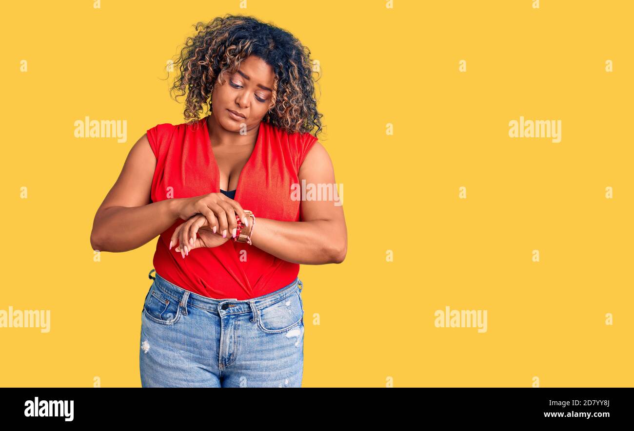 Young african american plus size woman wearing casual style with ...