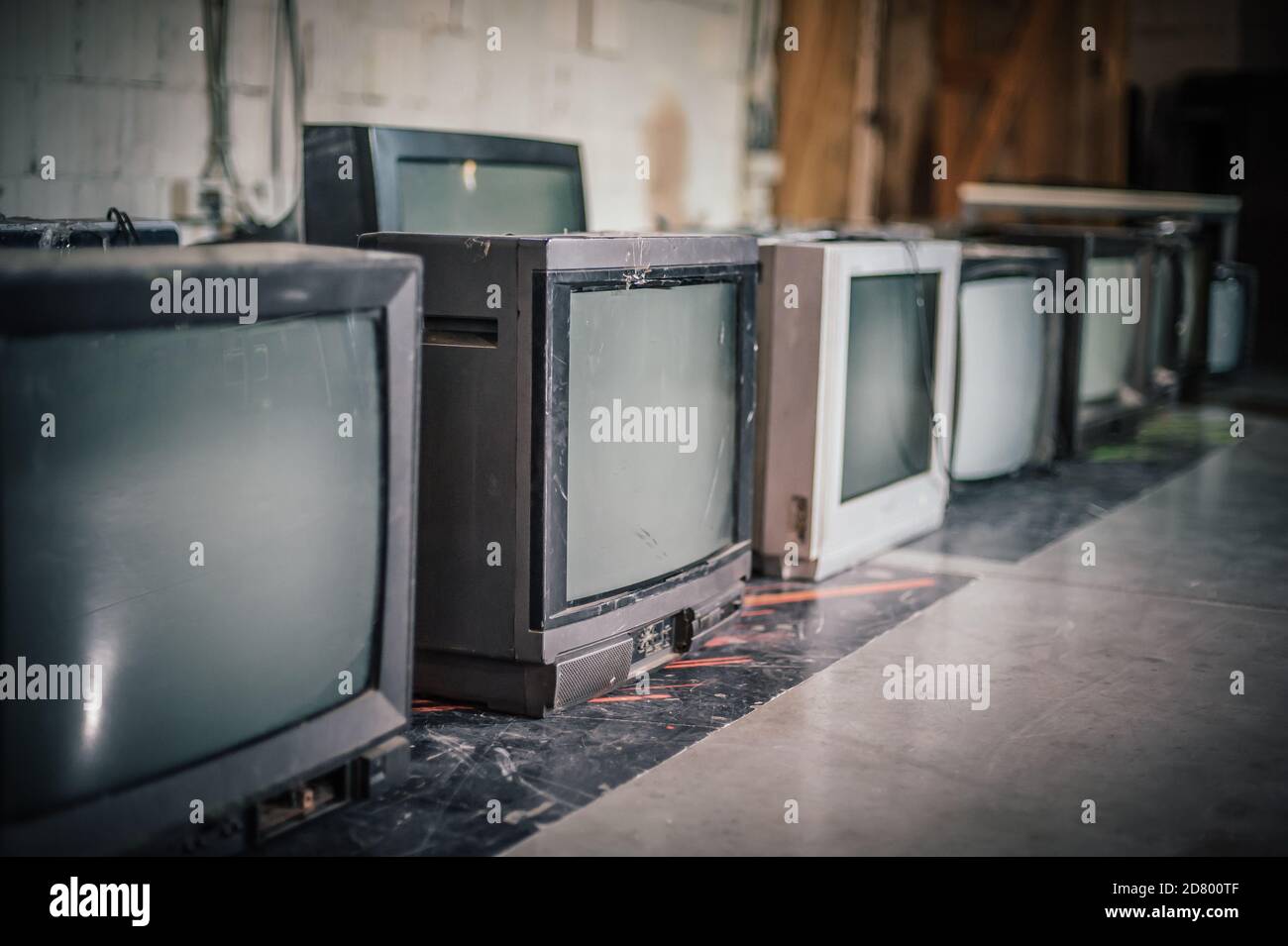 Stack of retro vintage televisions stacked. Lifestyle details, old TV ...