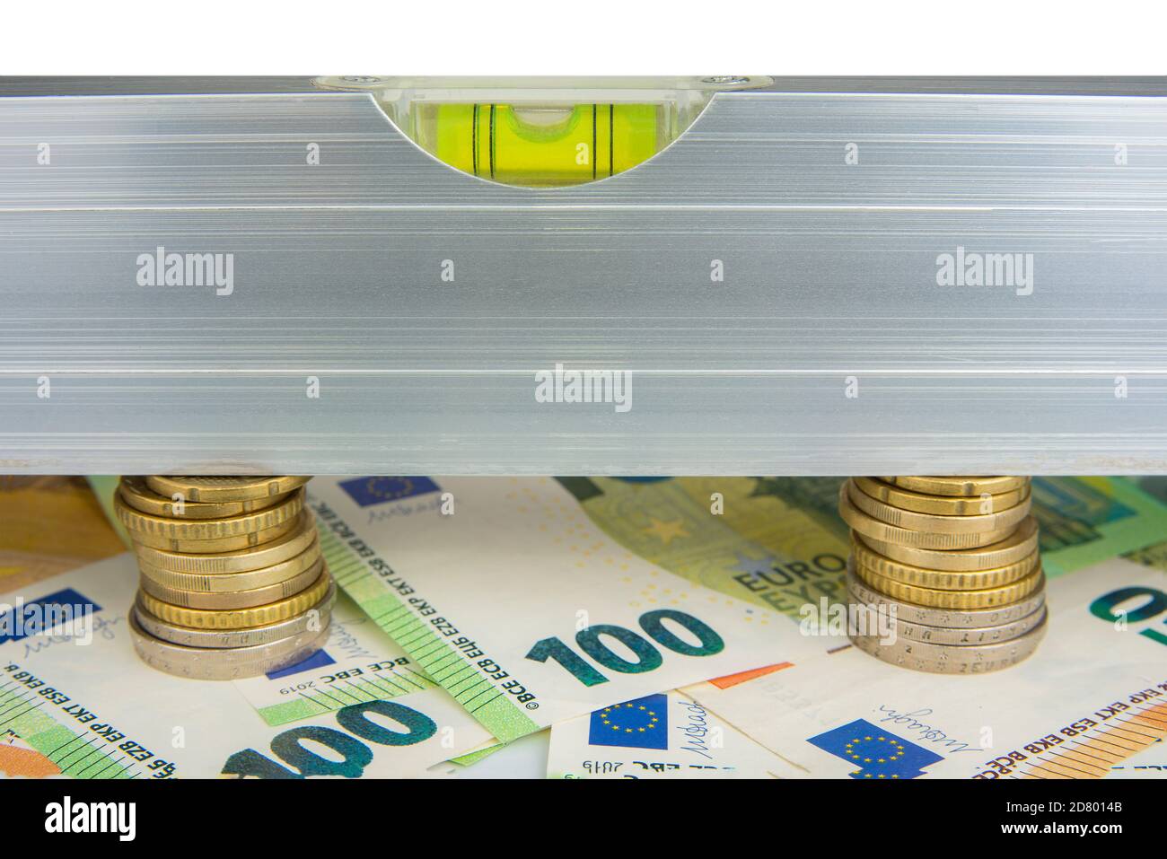 Paper money and coins with a level. Money balance concept Stock Photo ...