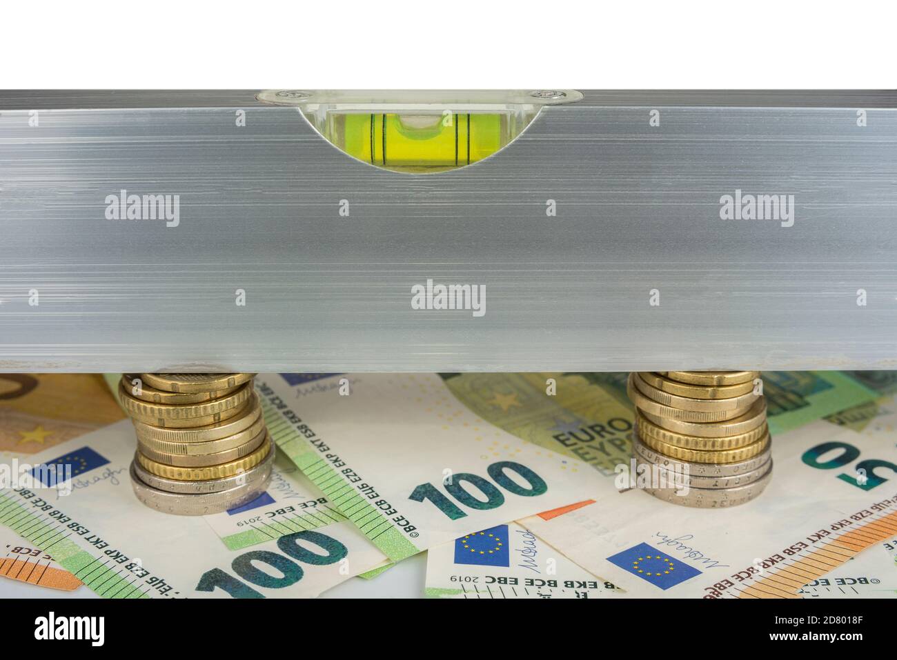 Paper money and coins with a level. Money balance concept Stock Photo ...