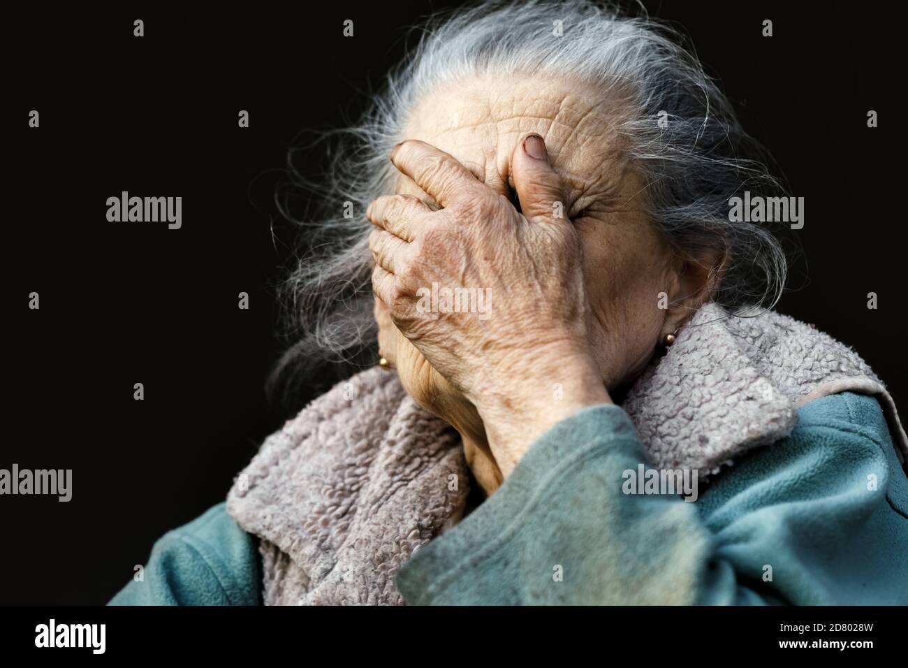 Old woman. Portrait of a very old and tired of life wrinkled woman ...