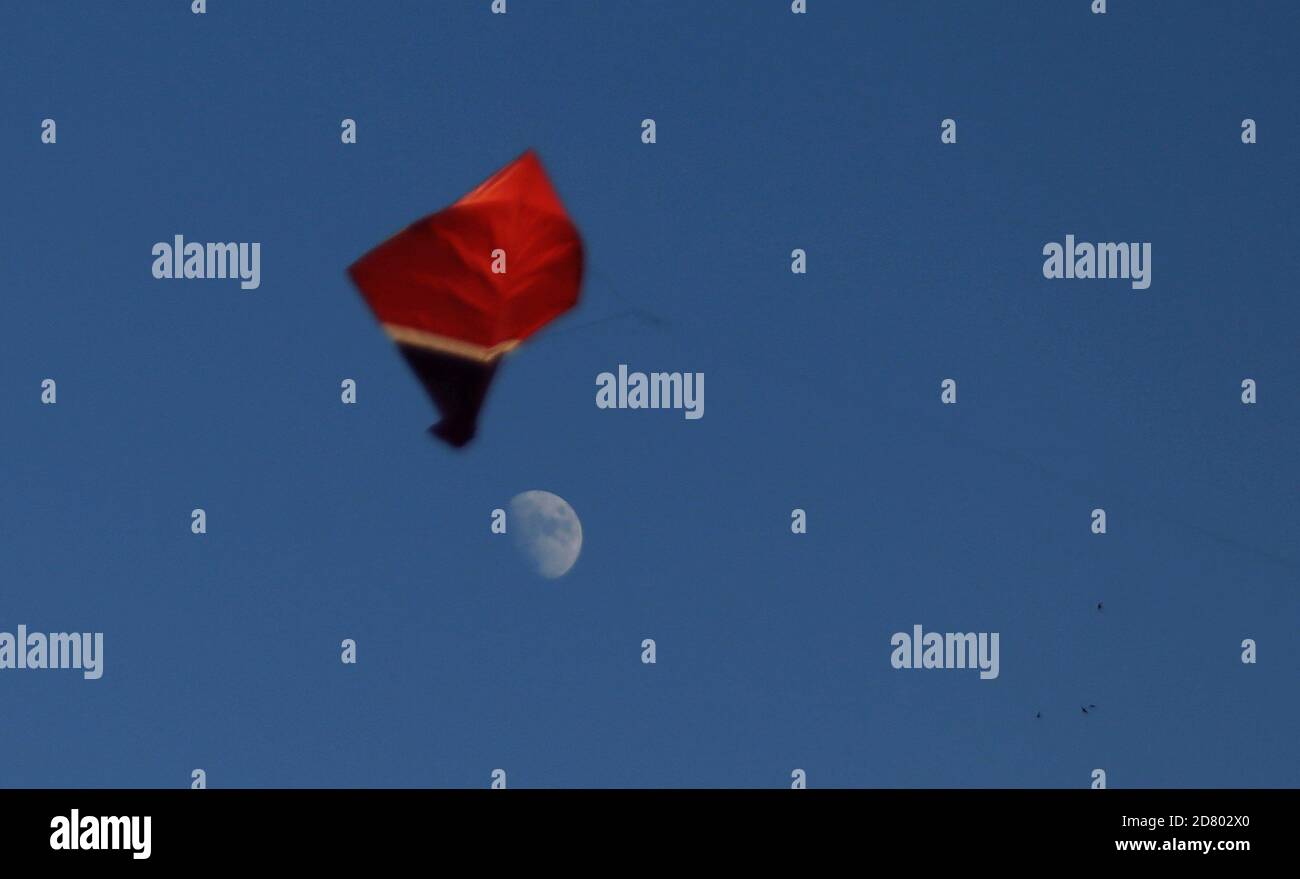 Kathmandu, Nepal. 26th Oct, 2020. A flying kite is pictured against ...