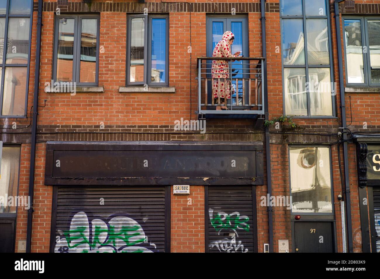 Smoking on a balcony hi-res stock photography and images - Alamy
