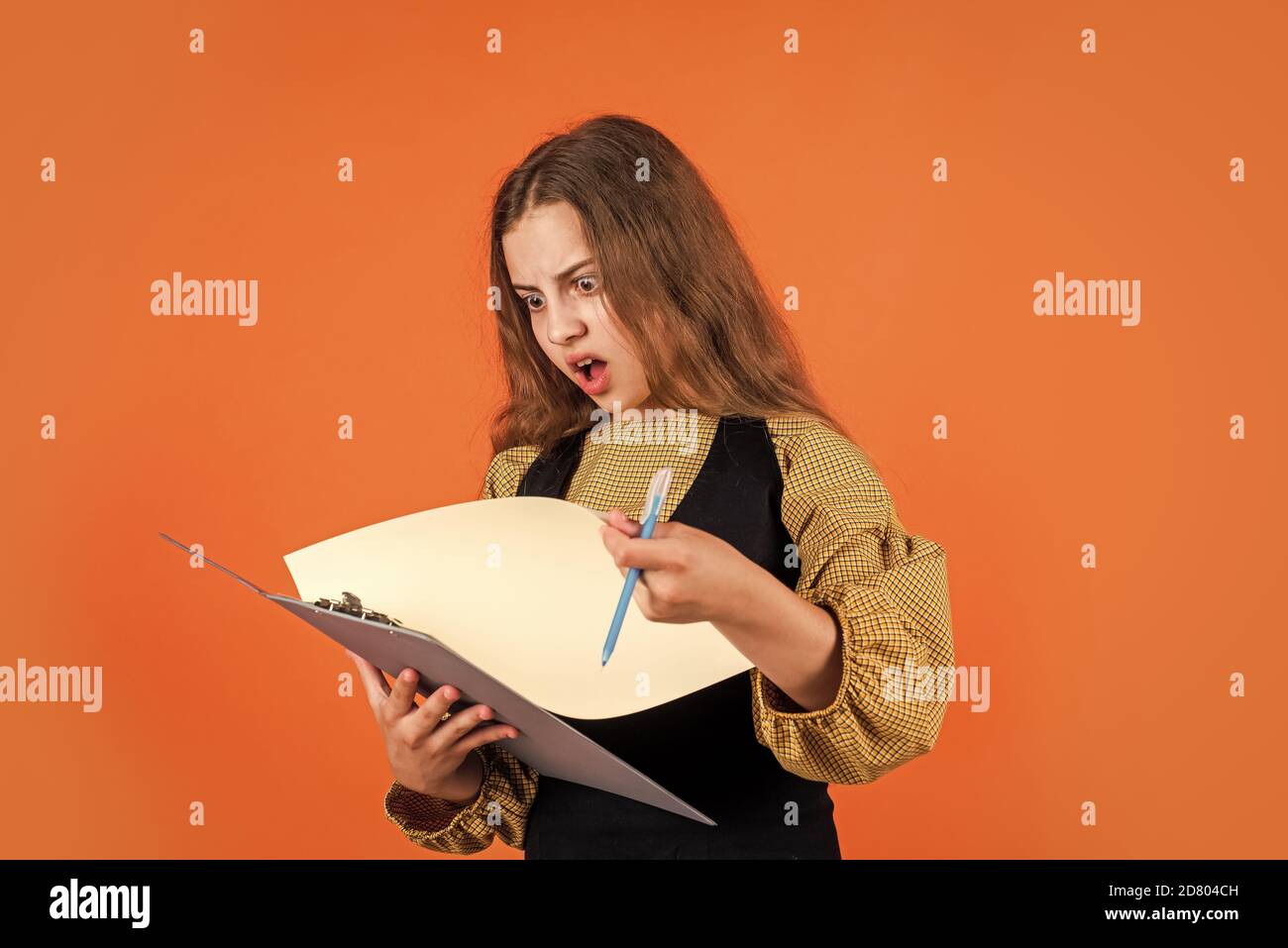 failed again. child is working with paper. paperwork concept. ready for ...