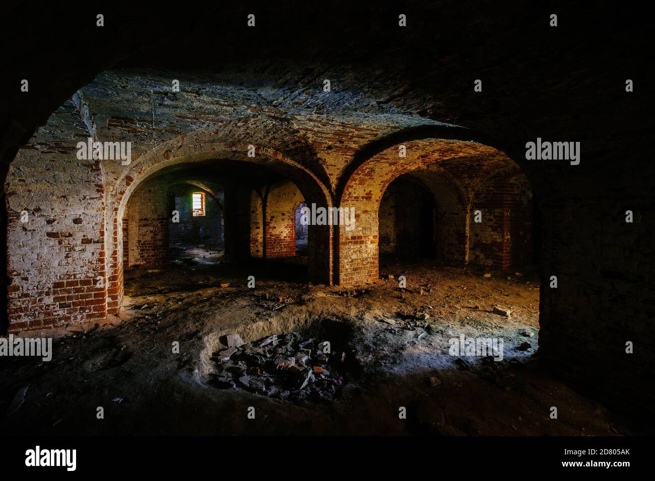 Dark and creepy vaulted red brick dungeon Stock Photo - Alamy