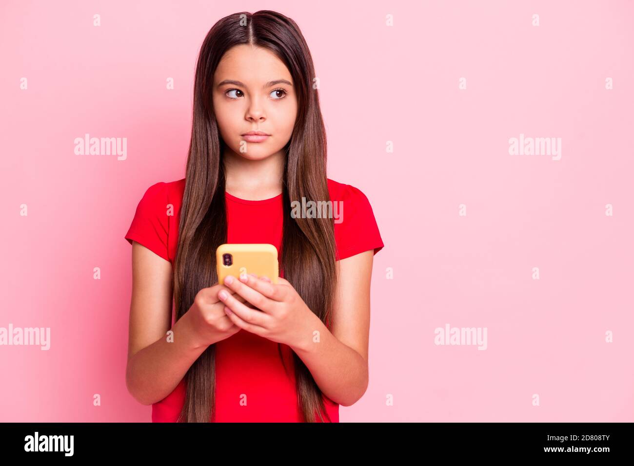 Photo of lovely cute little lady long hairdo hands hold telephone typing scrolling feed read ...