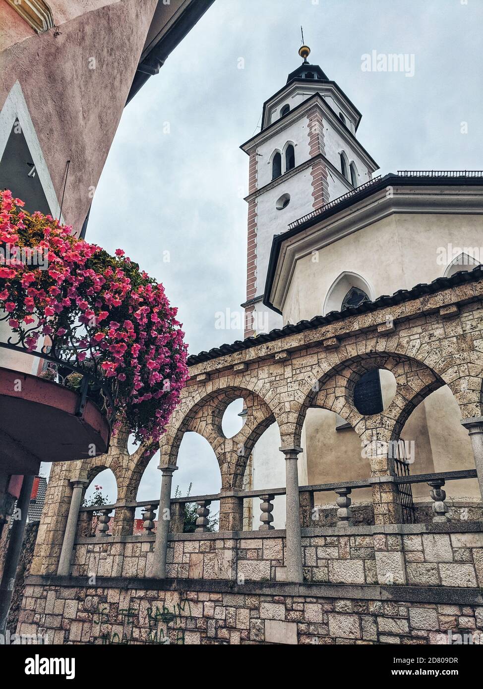 A picturesque view of the rainy streets of the old city Kranj against ...