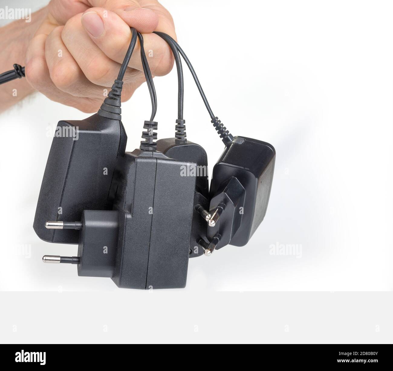 Mobile phone chargers on a white background Stock Photo - Alamy