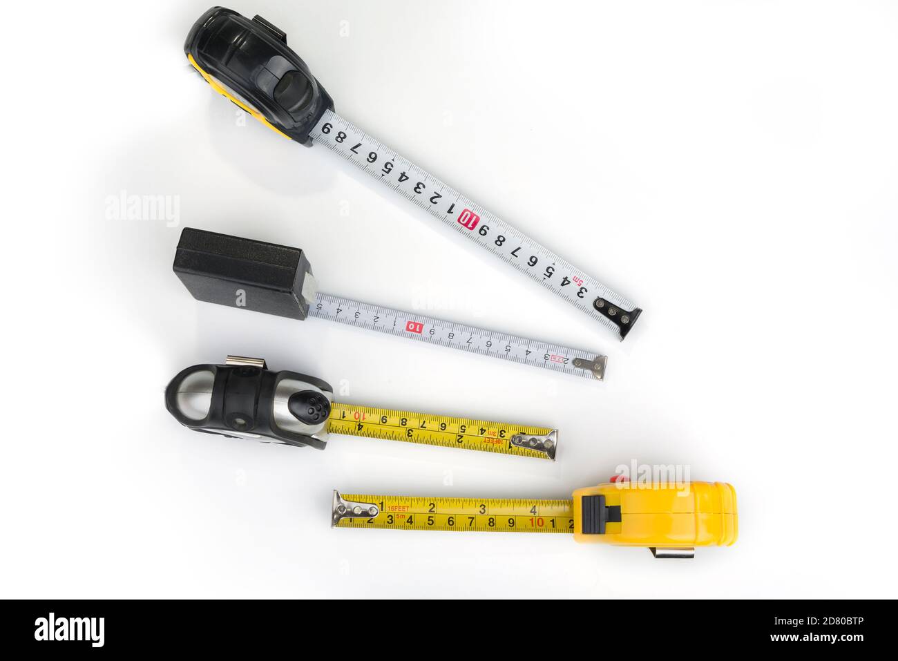 Measure tapes on a white background. Inches and centimeters Stock Photo ...