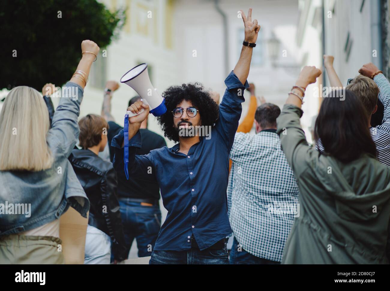 Group of people activists protesting on streets, strike and ...