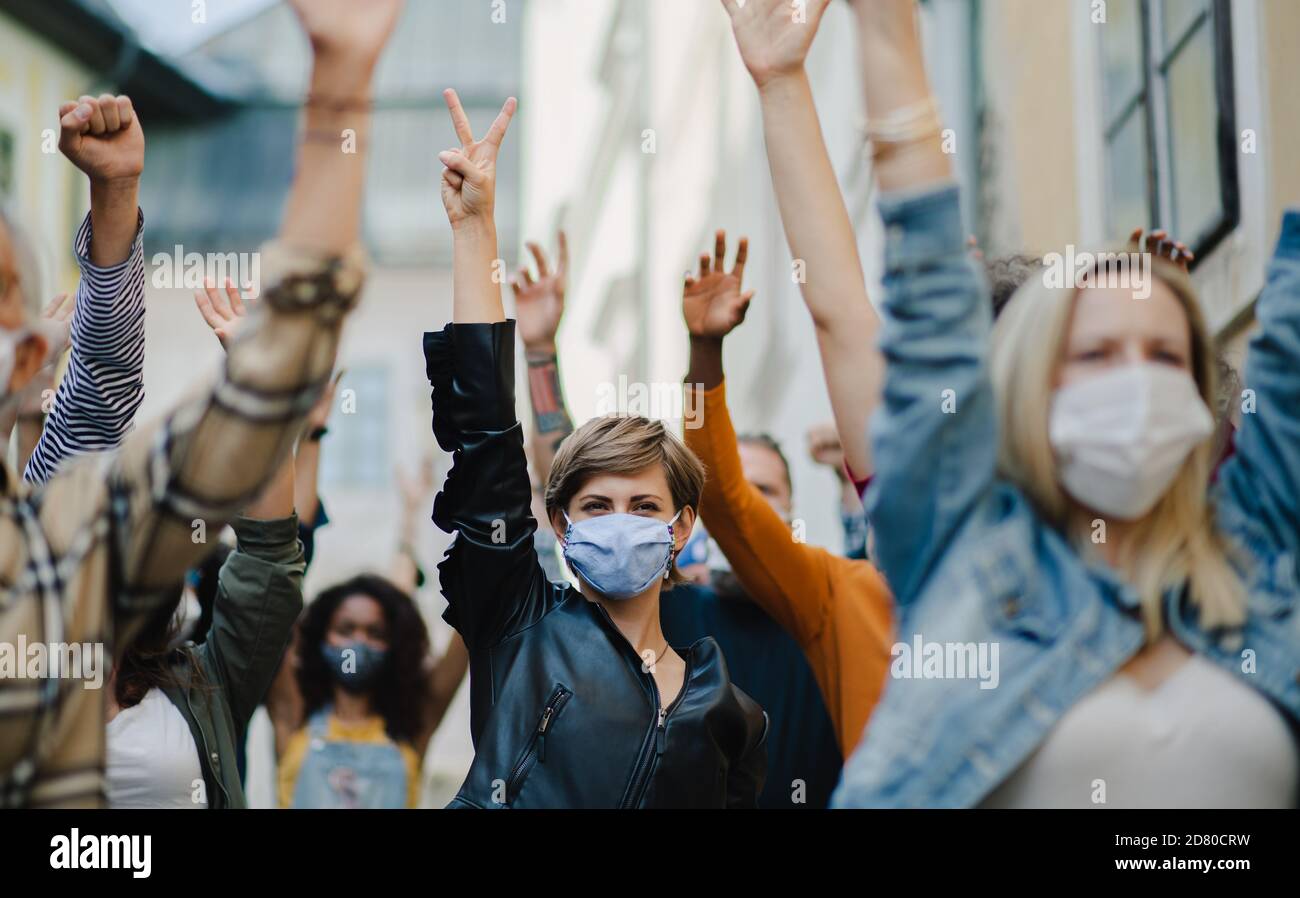 Group of people activists protesting on streets, strike and ...