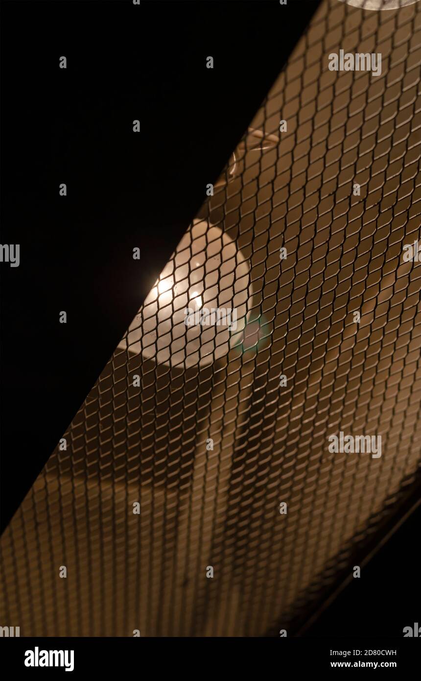 Unfocused photo of industrial emergency lighting. Thin light Electric ...