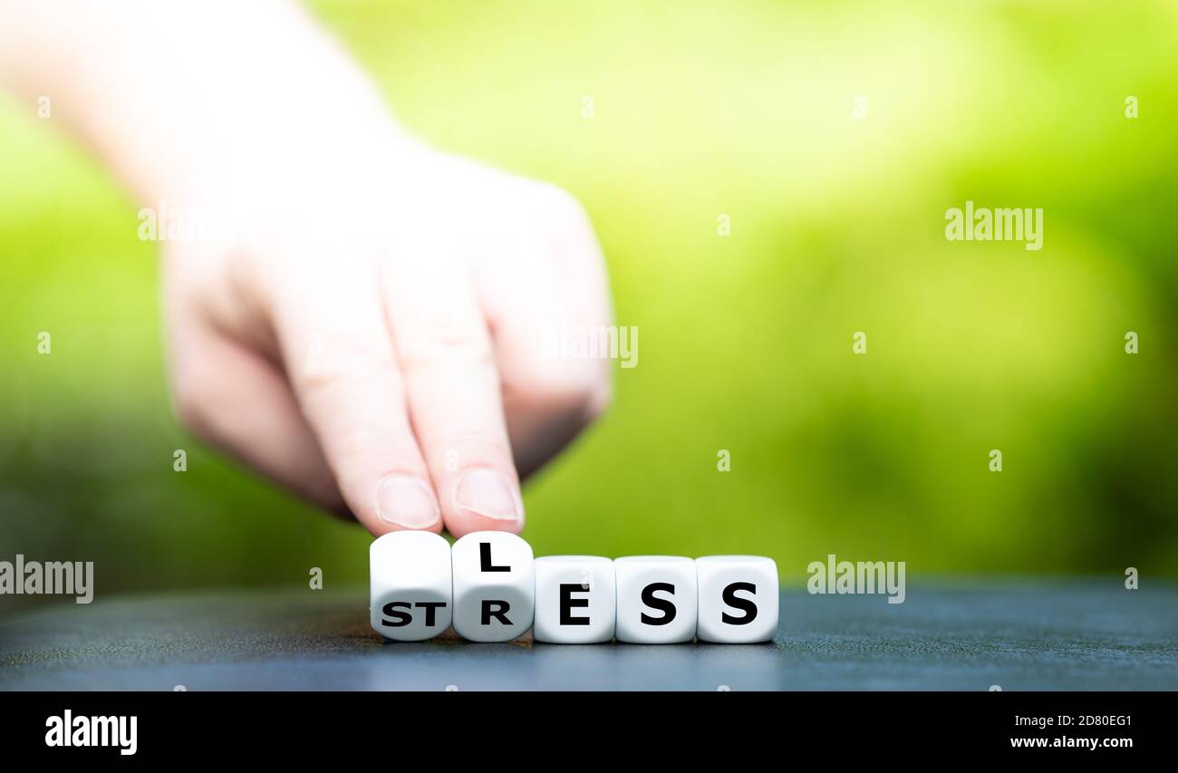 Symbol for less stress. Hand turns dice and changes the word "stress ...