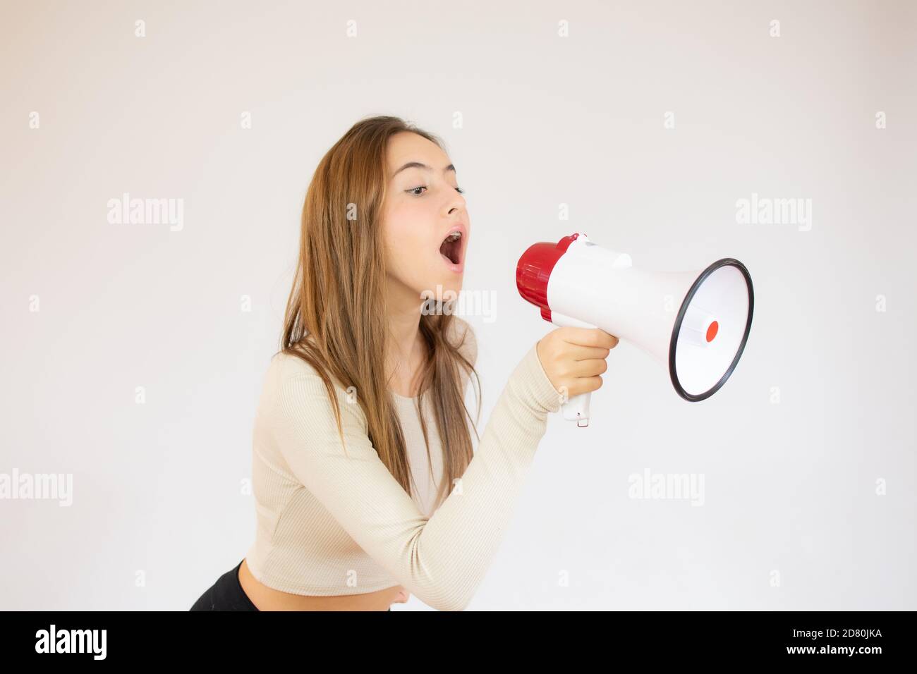 excited girl screaming in megaphone Stock Photo - Alamy