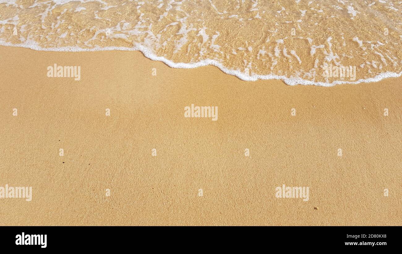 Texture background with surf, sea water and sand on the beach Stock ...