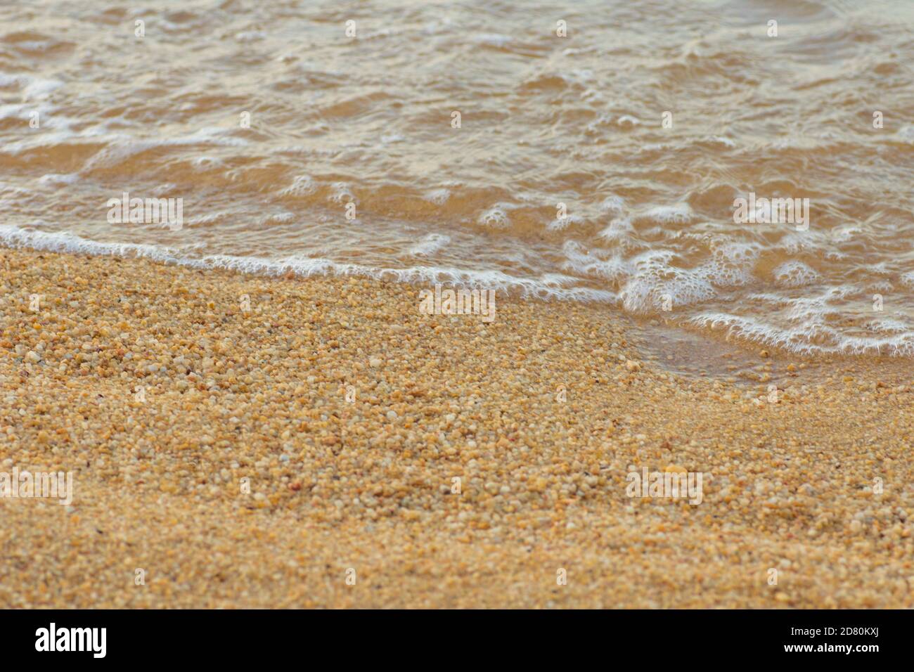 Texture background with surf, sea water and sand on the beach Stock ...