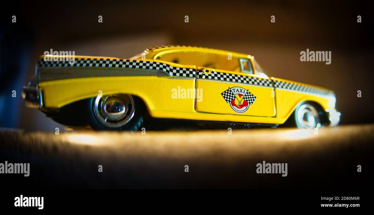 Toy car yellow taxi cab hi-res stock photography and images - Alamy