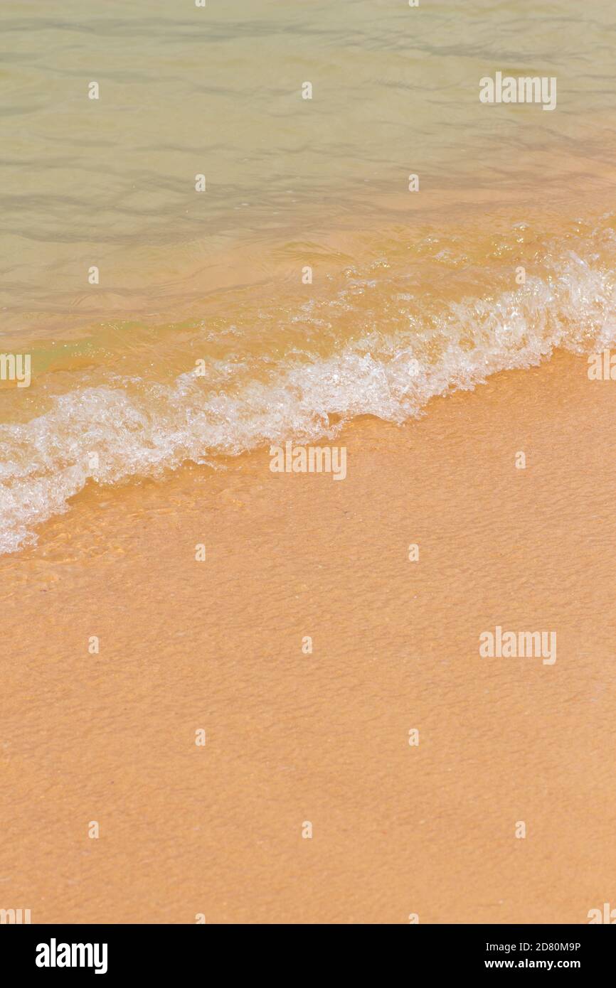 Texture background with surf, sea water and sand on the beach Stock ...