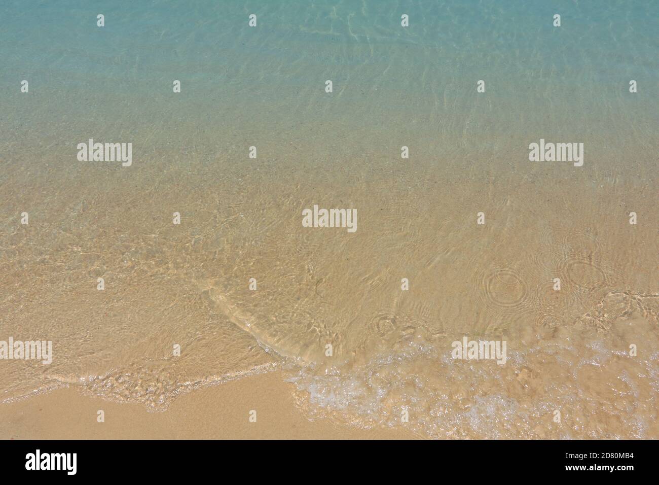 Texture background with surf, sea water and sand on the beach Stock ...