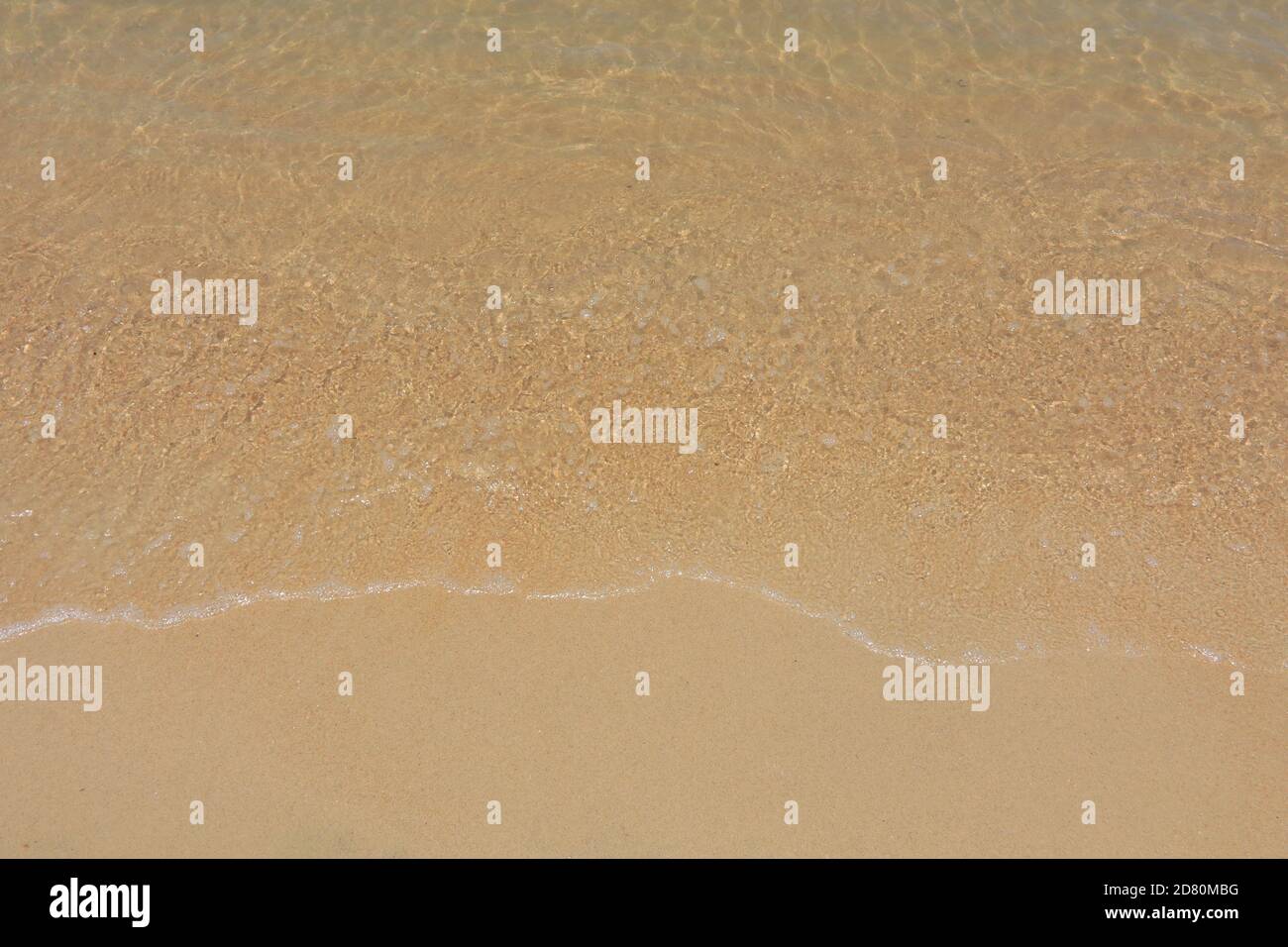 Texture background with surf, sea water and sand on the beach Stock ...