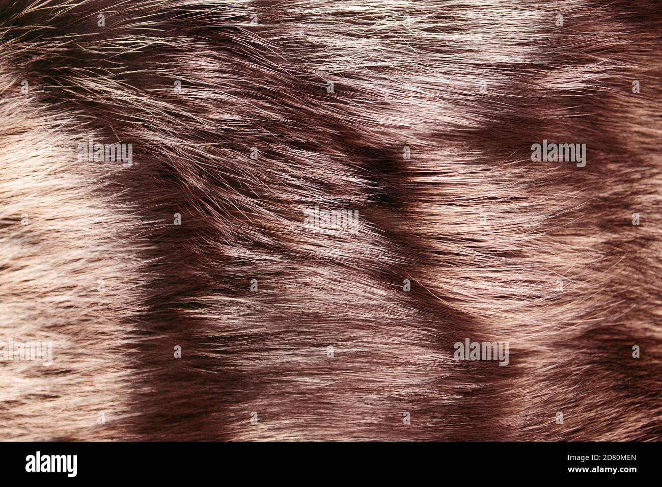 Dyed furry coat in brown or red color, close up. Artificial fur for ...