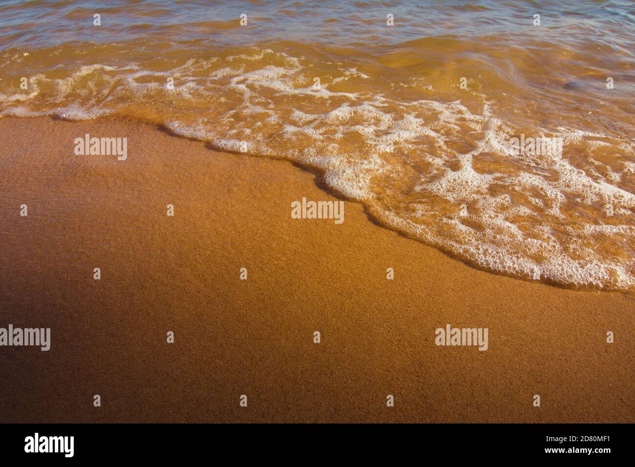 Texture background with surf, sea water and sand on the beach Stock ...