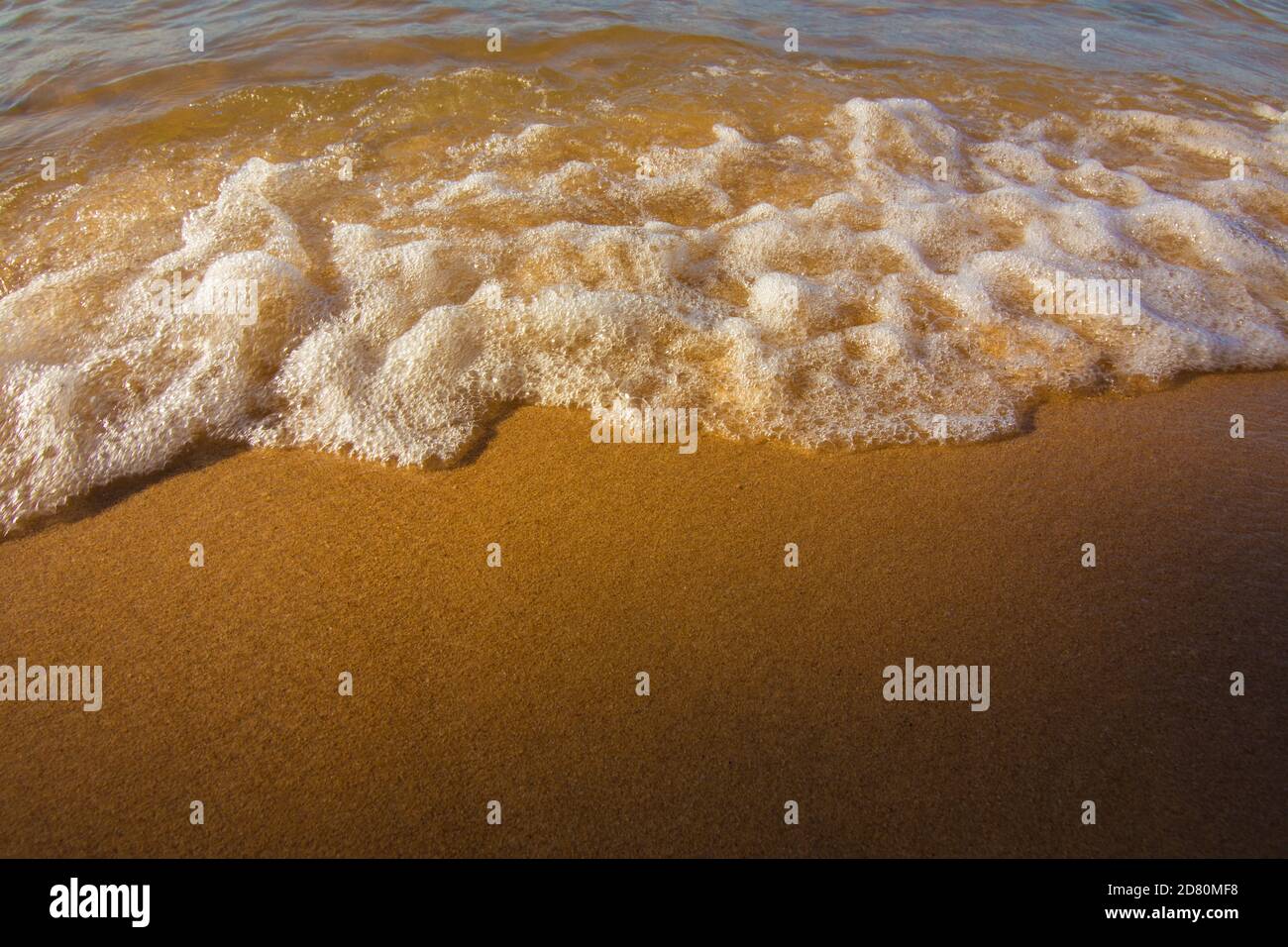 Texture background with surf, sea water and sand on the beach Stock ...